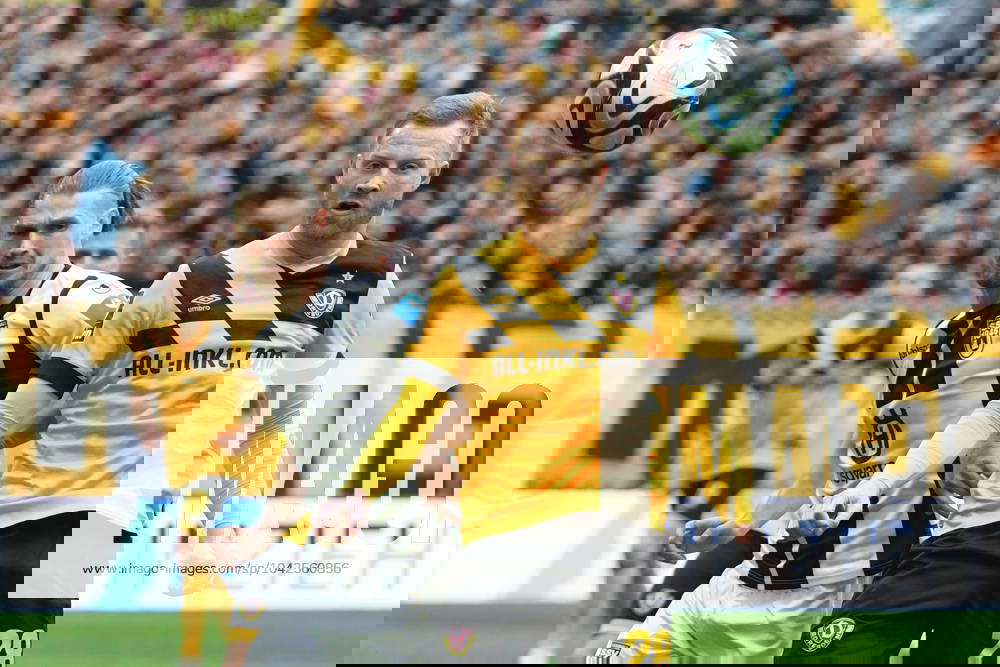 Dennis Chessa SSV Ulm 1846 left and Paul Will SG Dynamo Dresden right ...