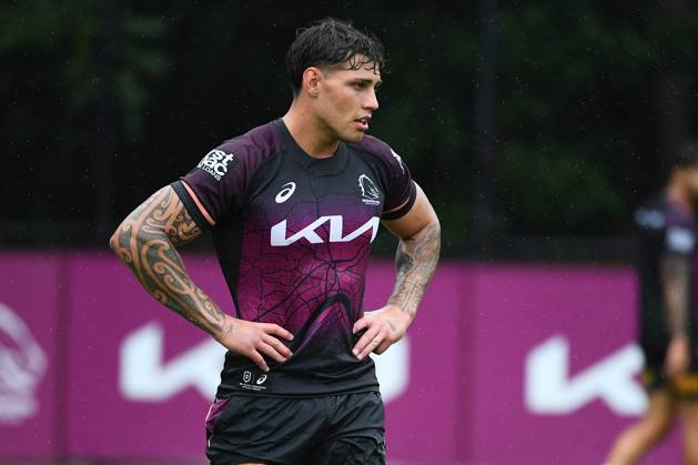 NRL BRONCOS TRAINING, Jordan Riki of the Broncos passes the ball during ...