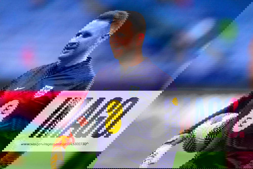 England Under-21 Goalkeeper Coach Tim Dittmer warms-up the England ...