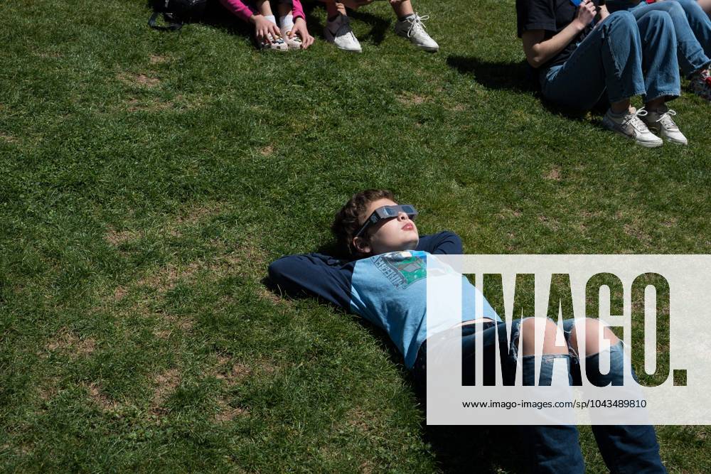 Syndication: Arizona Republic Brian Howell, 10, lies on the grass and ...