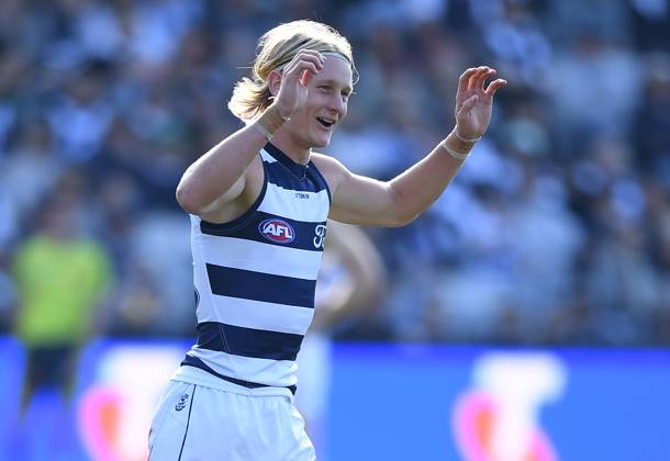 AFL CATS KANGAROOS, Oliver Dempsey of the Cats (left) is seen in action ...