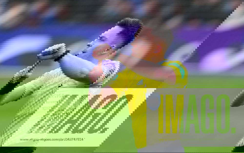 Referee Matthew MacDermid points to the penalty spot after a VAR check ...