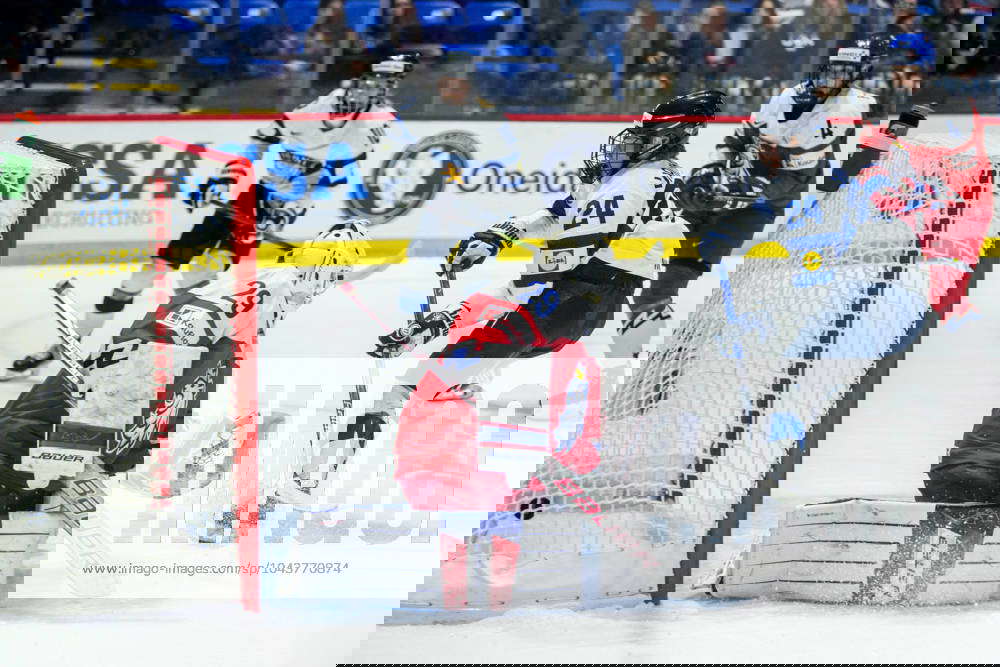 240414 Viivi Vainikka of Finland scores 1 2 behind goaltender Klara ...