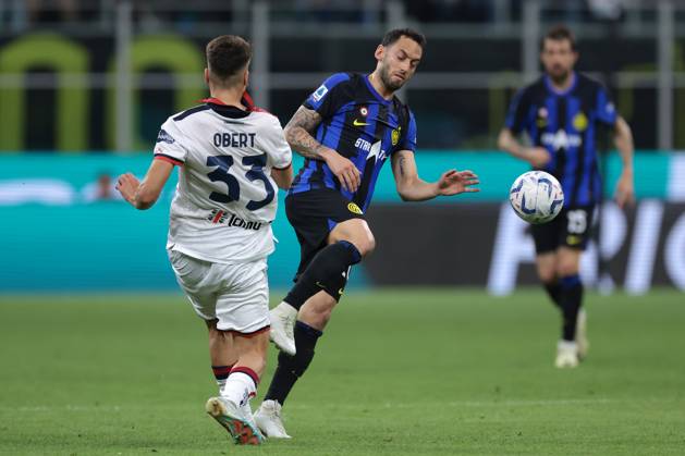 Milan, Italy, 14th April 2024. Adam Obert of Cagliari clashes with ...
