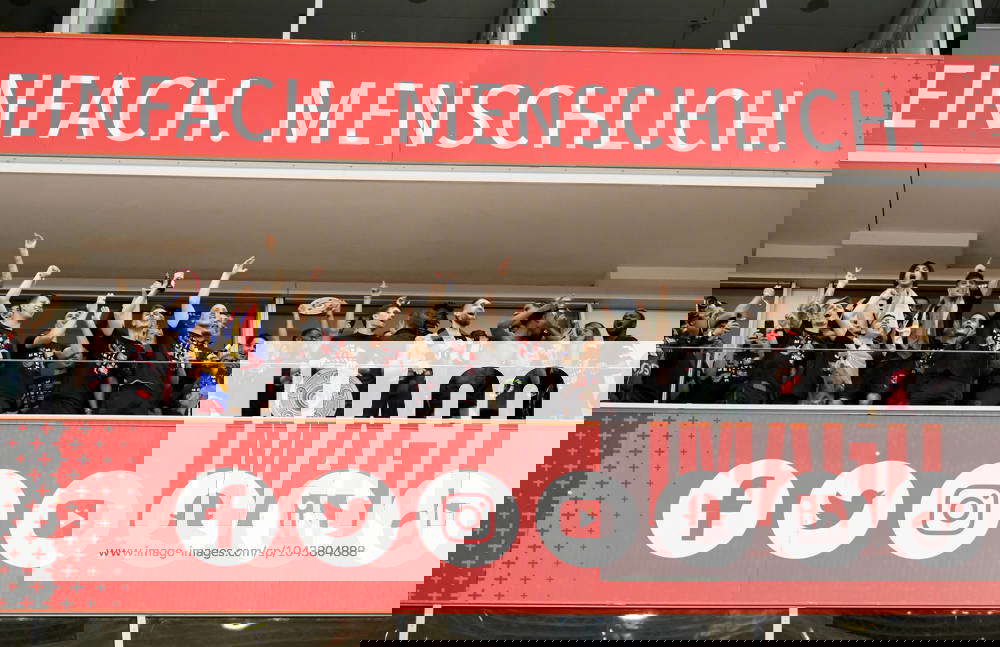 Team LEV celebrates the German championship on a balcony in the stadium ...