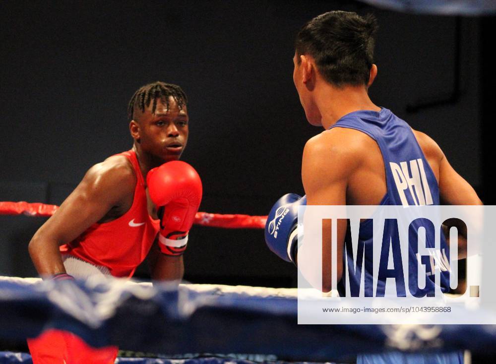 Syndication: Pueblo Cheiftain USA boxer Terry Washington sizes up his ...