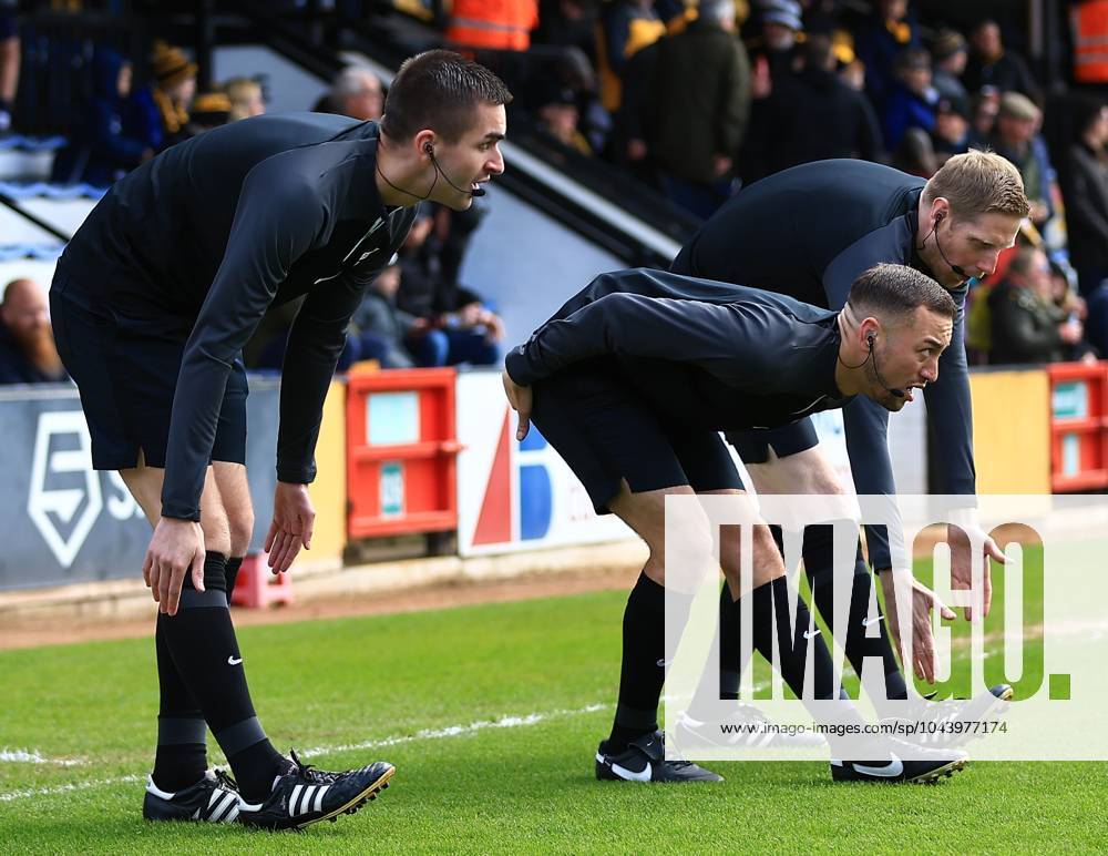 Referee Paul Howard (C) Assistant Referee Kevin Howick (R) and ...