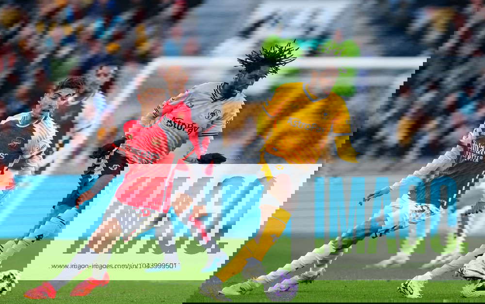 Boubacar TraorÃ of Wolves turns Kai Havertz of Arsenal during the ...