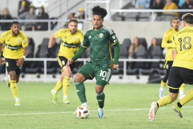 : Portland Timbers midfielder Evander handles the ball against the ...