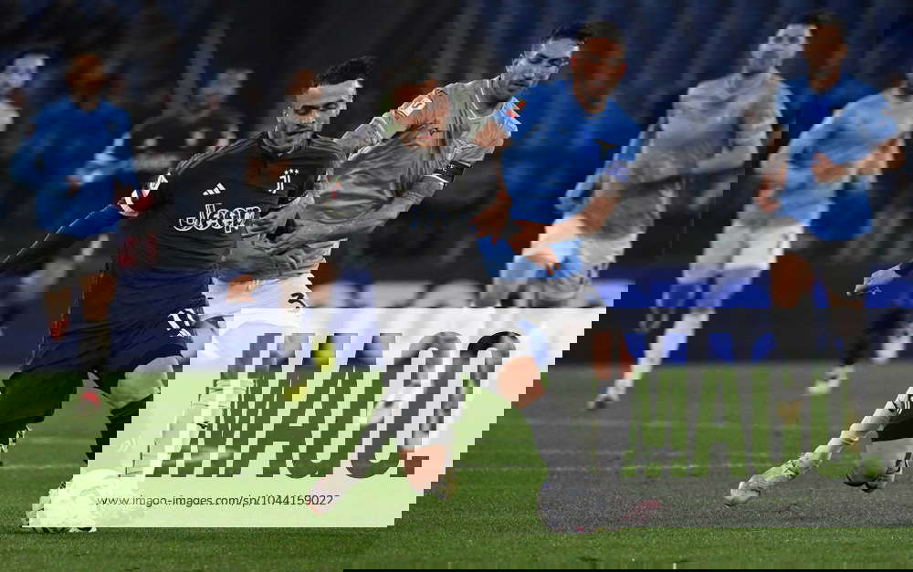 Filip Kostic of Juventus F.C. anfd Danilo Cataldi of S.S. Lazio during ...