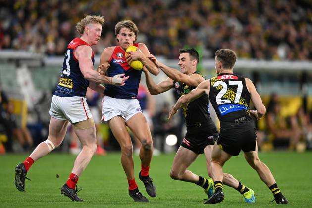 AFL TIGERS DEMONS, Caleb Windsor of the Demons contests a mark during ...