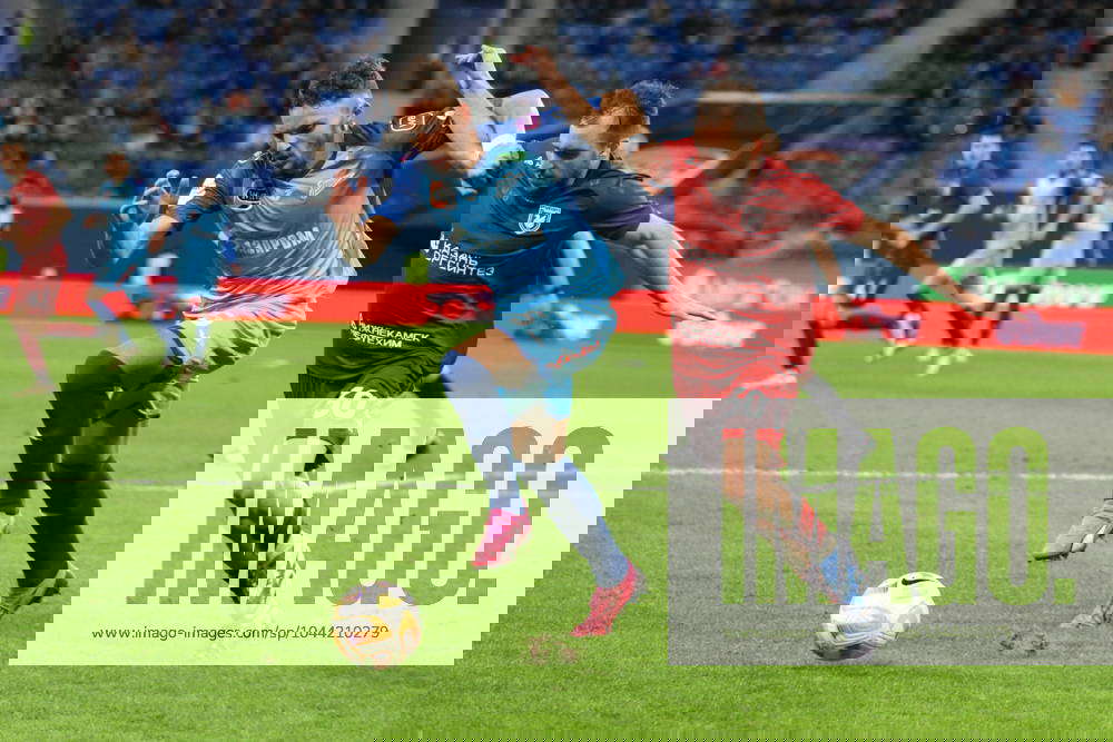 Strahinja Erakovic (25) of Zenit and Valentin Vada (30) of Rubin seen ...