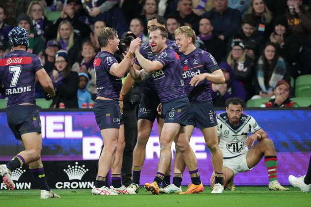 NRL STORM RABBITOHS, Tyran Wishart of the Storm celebrates with Reimis ...