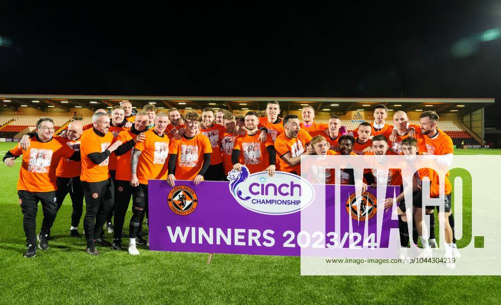 A Dundee United players celebrate behind a Cinch SPFL Championship ...