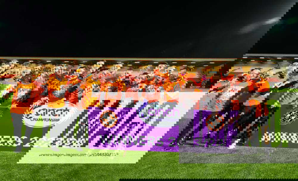 A Dundee United players celebrate behind a Cinch SPFL Championship ...