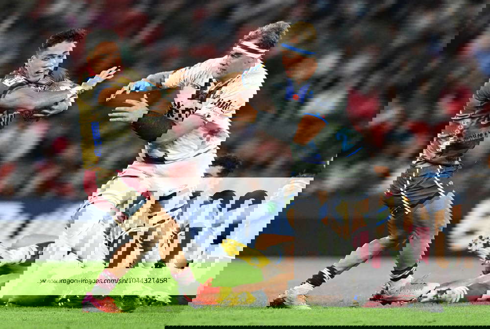 SUPER RUGBY REDS BLUES, Kalani Thomas (left) of the Reds in action ...