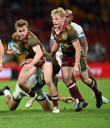 SUPER RUGBY REDS BLUES, Tim Ryan and Tom Lynagh of the Reds in action ...