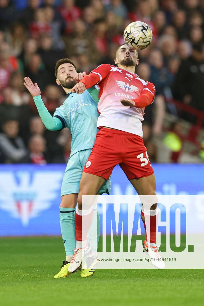 Josh Sheehan of Bolton Wanderers and Adam Phillips of Barnsley Barnsley ...