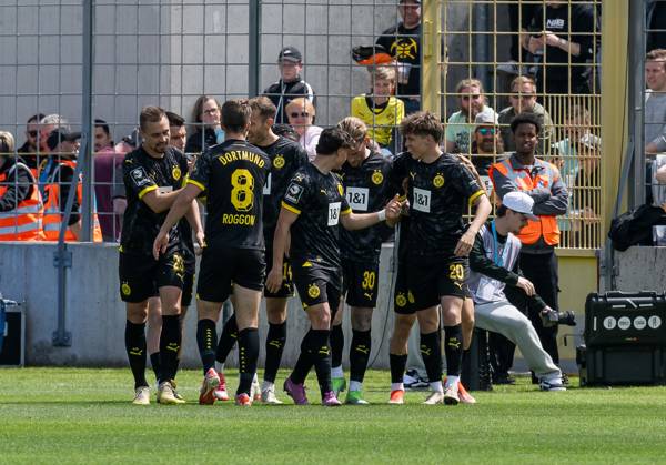 Dortmund players celebrate with Ole Pohlmann BV Borussia Dortmund U23 ...