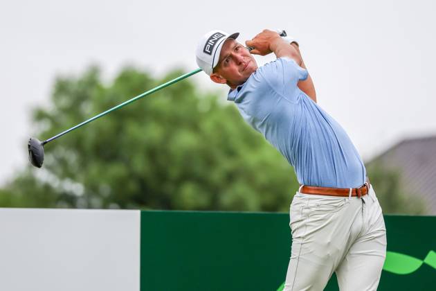 : Sam Stevens hits his tee shot on the 12th hole during the third round ...