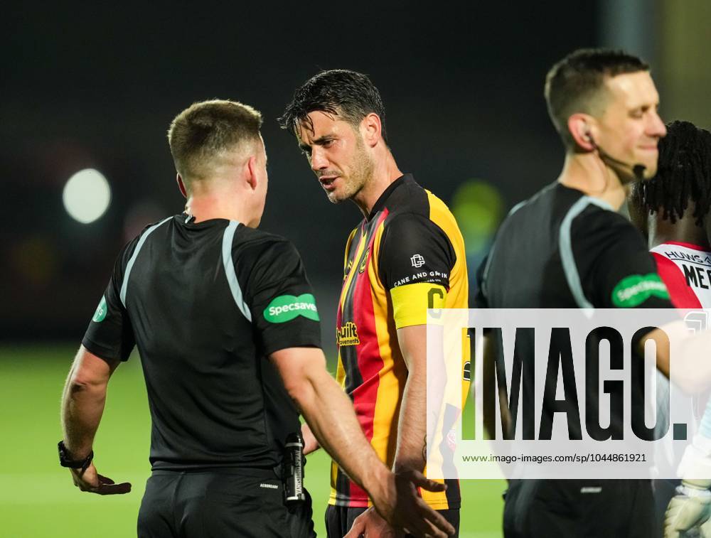 Partick Thistle captain Brian Graham speaks to Referee Grant Irvine at ...
