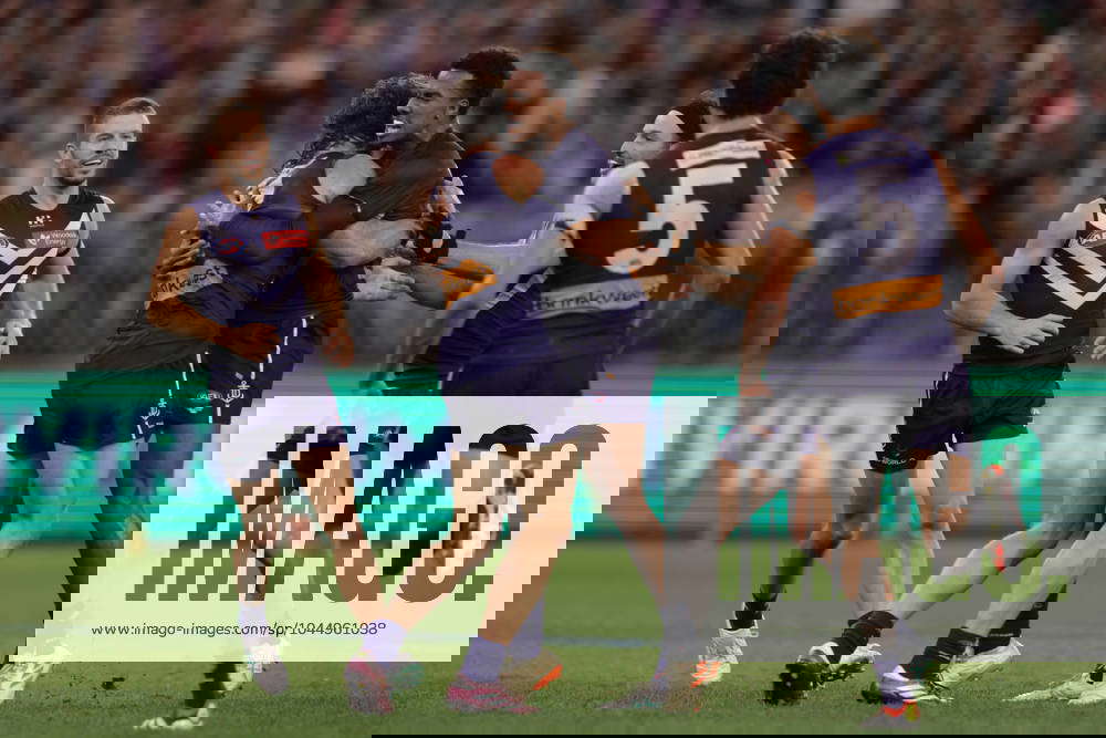 AFL DOCKERS SWANS, Brandon Walker of the Dockers is congratulated by ...