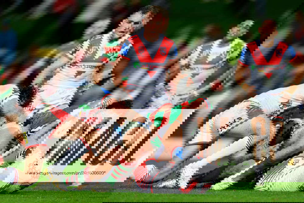 NRL DRAGONS RABBITOHS, Davvy Moale of the Rabbitohs is tackled by Tom ...