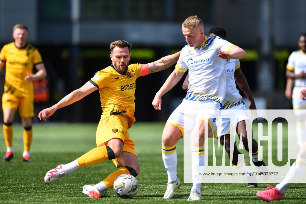 Michael Devlin of Livingston and Cammy MacPherson of St Johnstone ...