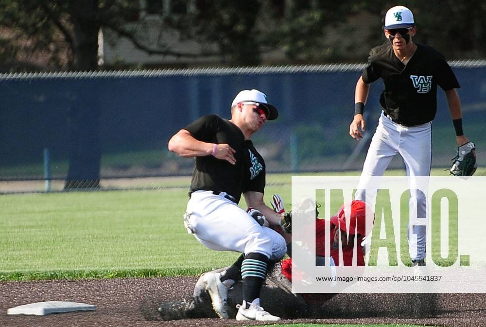 Syndication: Canton Repository West Branch s Boston Mulinix tags out ...