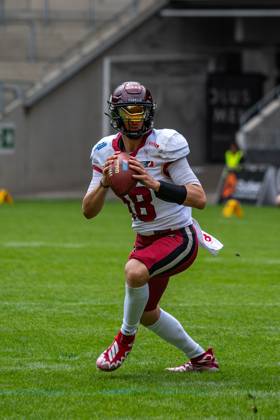 Jadrian Clark QB, 18, Rhein Fire runs with the ball and looks for his ...