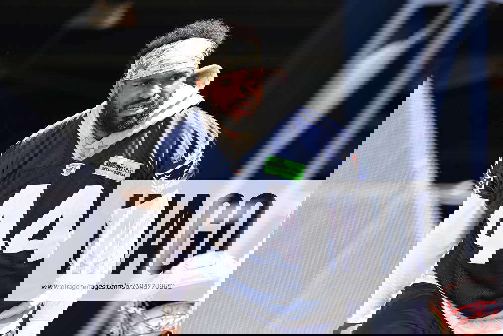 : New England Patriots linebacker Joe Giles-Harris walks to the ...