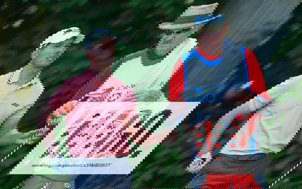 RBC Canadian Open Mike Weir of Canada hands his club to his caddie on ...