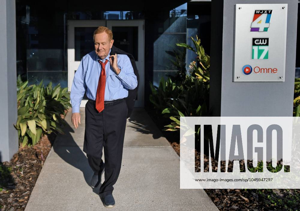 Syndication: Florida Times-Union With his jacket over his shoulder, Tom ...