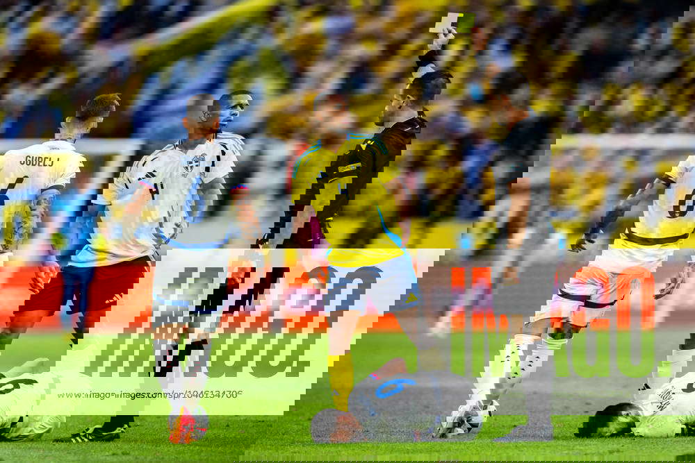 240608 Isak Hien of Sweden receives a yellow card during the ...