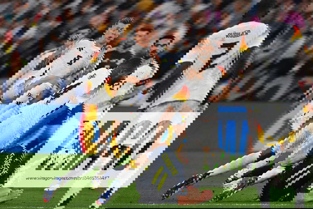 from left Toni KROOS GER, Jonathan Tah GER, Ryan CHRISTIE Scotland ...