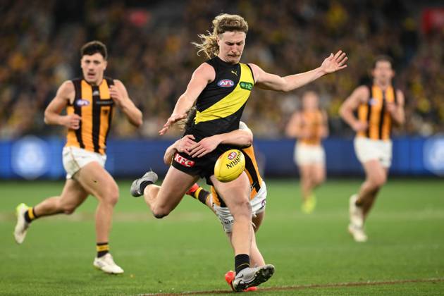 AFL TIGERS HAWKS, Will Day of Hawthorn tackles Hugo Ralphsmith of ...