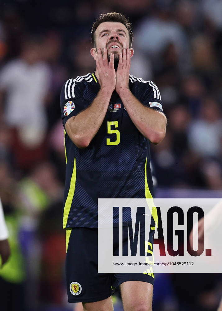 Cologne, Germany, 19th June 2024. Grant Hanley of Scotland reacts after ...