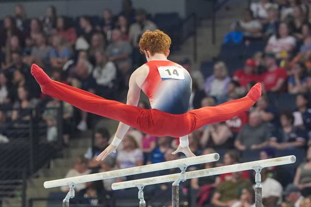 MINNEAPOLIS, MN - JUNE 27: Josh Karnes competes on the parallel bars at ...
