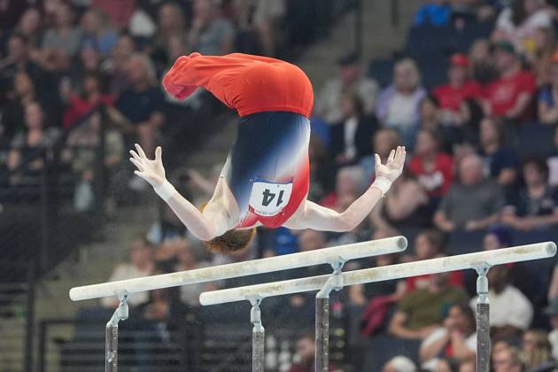 MINNEAPOLIS, MN - JUNE 27: Josh Karnes competes on the parallel bars at ...