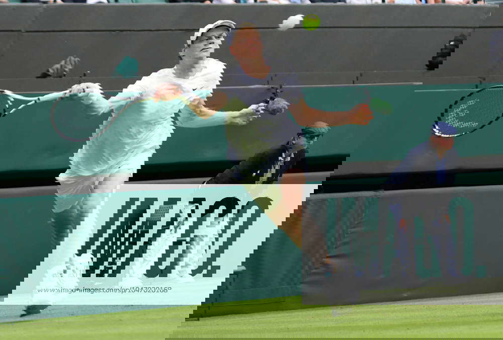 Italian jannik Sinner plays a forehand in his first round match against ...