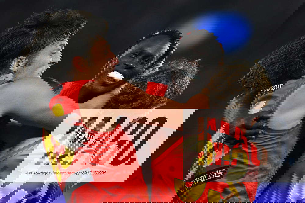 AFL KANGAROOS SUNS, Mac Andrew of the Suns (centre) celebrates with ...