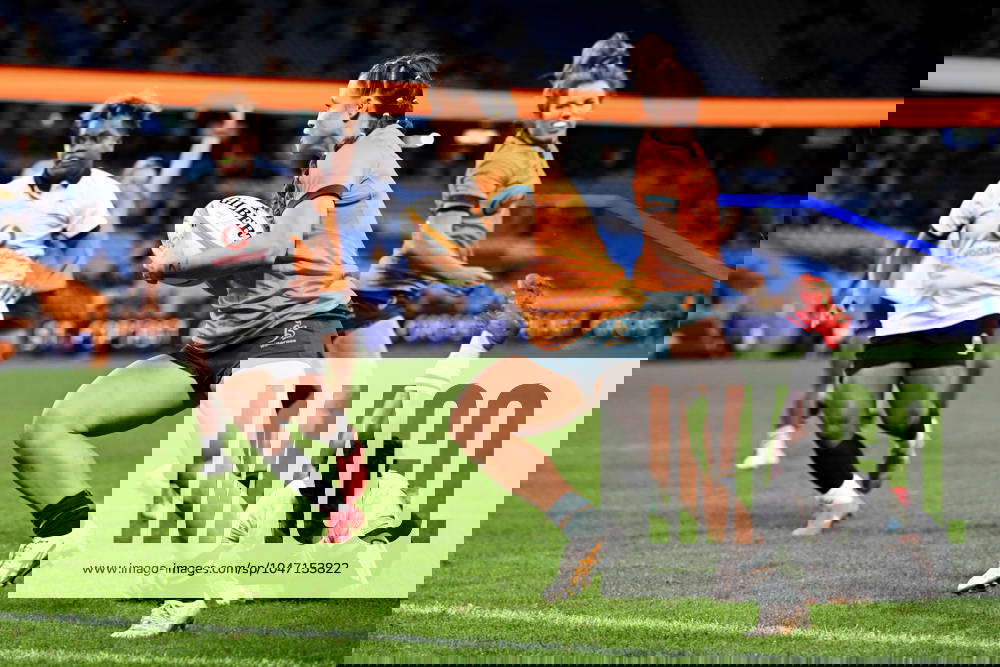 RUGBY WALLAROOS FIJI, Desiree Miller of Australia runs in to score a ...