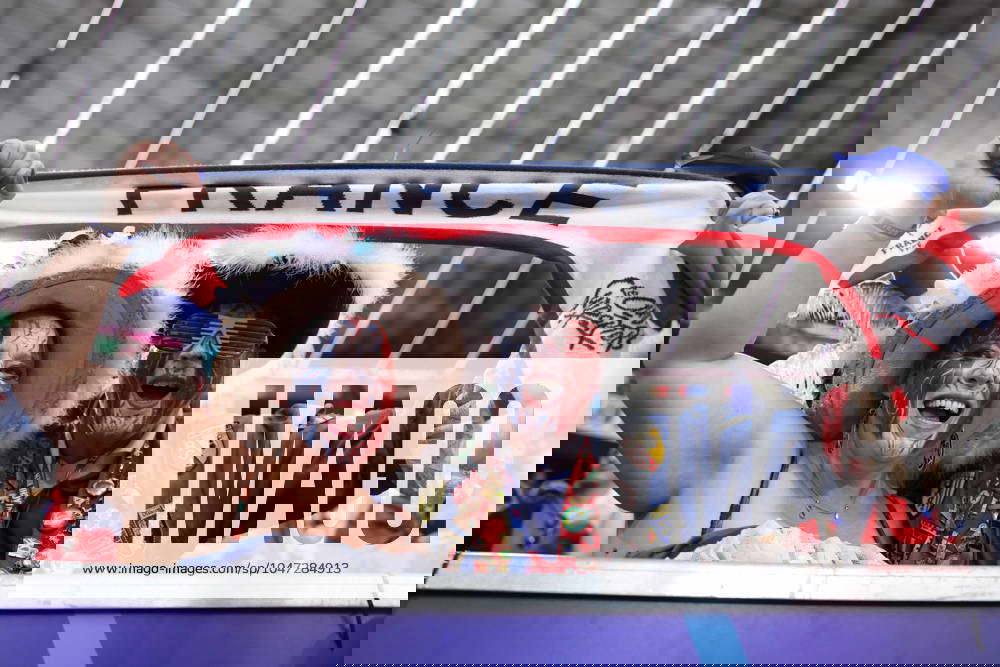 Munich, Germany, 9th July 2024. France fans in Fancy dress cheer on ...