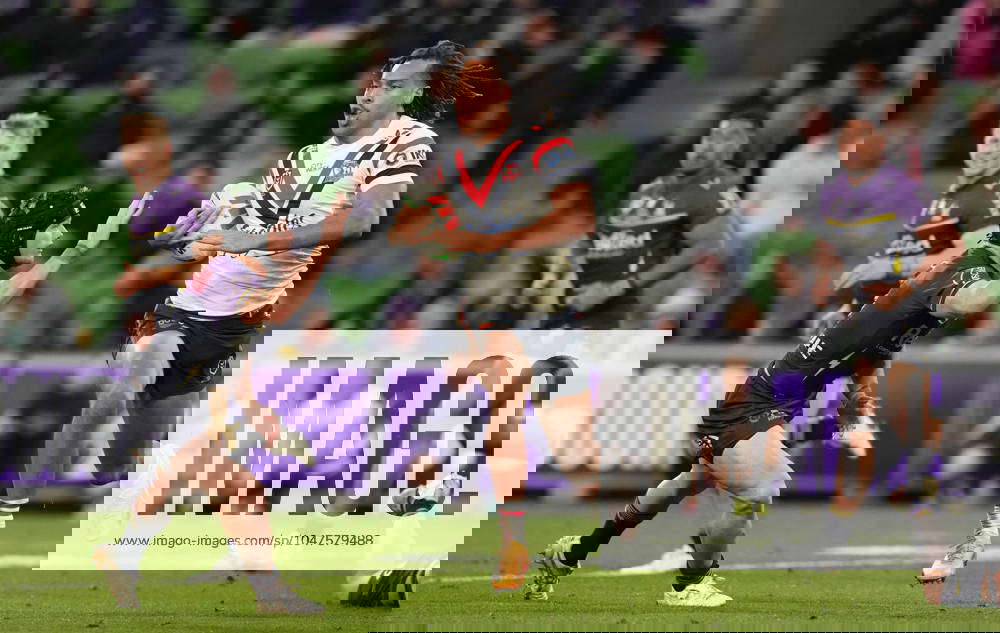 NRL STORM ROOSTERS, Dominic Young of the Roosters runs with the ball ...