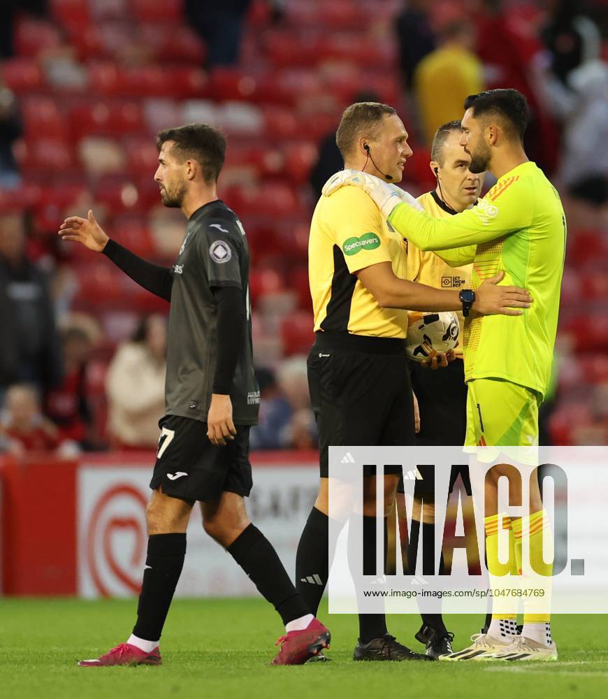 Aberdeen goalkeeper Dimitar Mitov end of match with referee Chris ...