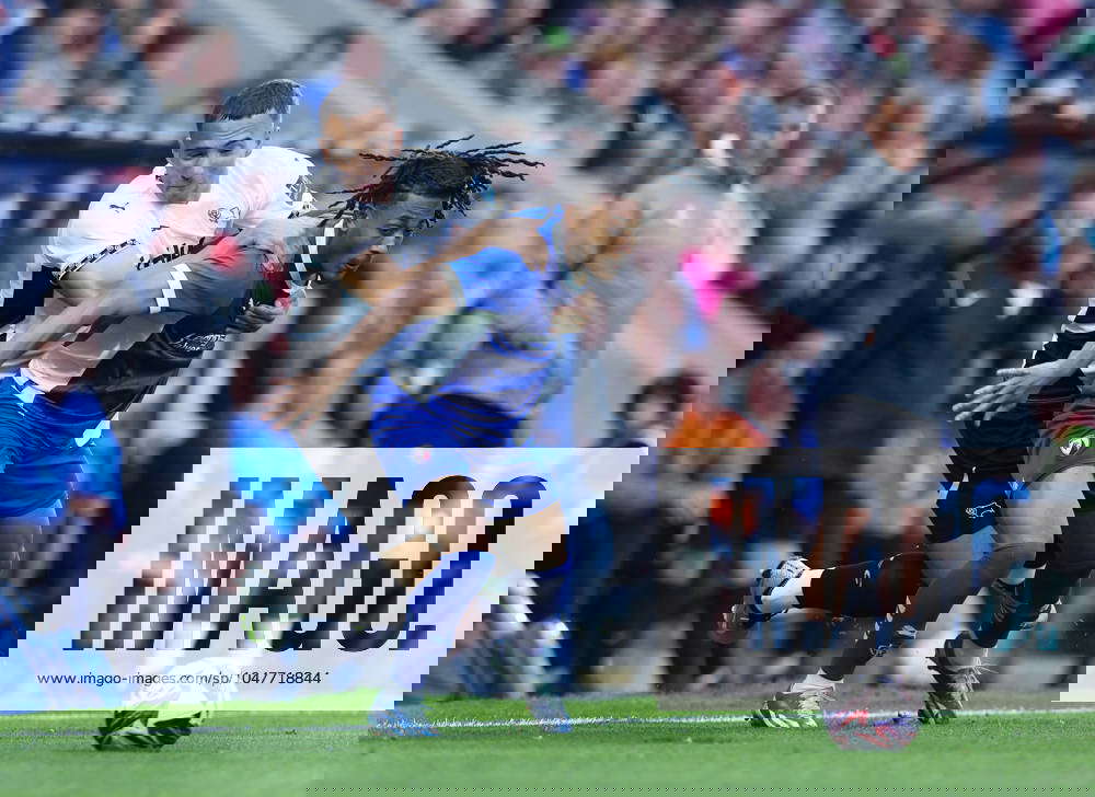 Kane Wilson of Derby County and Lewis Gordon of Chesterfield ...