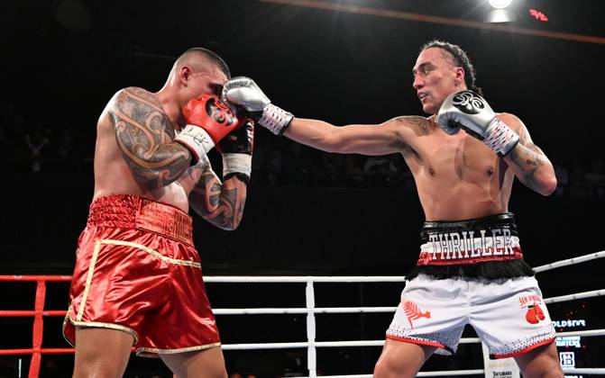 BOXING HUNI PILCHER, Clay Waterman is punched by Lucas Miller during ...