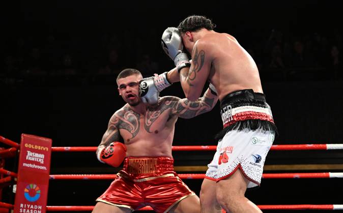 BOXING HUNI PILCHER, Clay Waterman is punched by Lucas Miller during ...