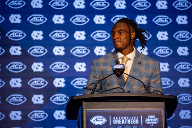 : North Carolina Tarheels quarterback Conner Harrell speaks with the ...