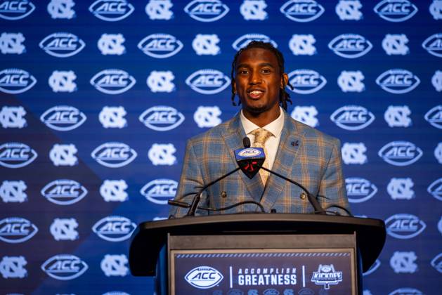 : North Carolina Tarheels quarterback Conner Harrell speaks with the ...